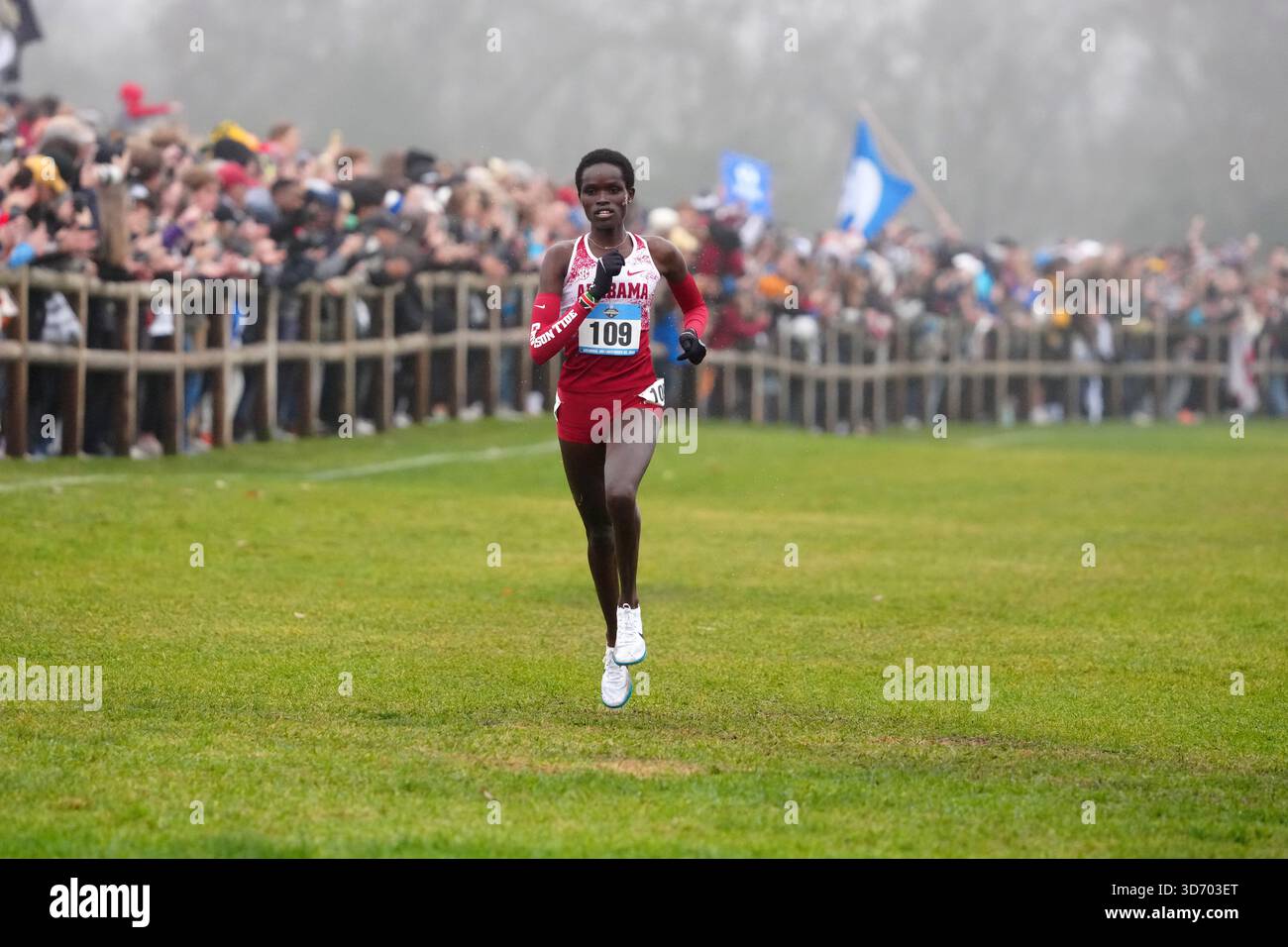 Doris Lemngole of Alabama wins the women's race in 18:25.4 during the ...