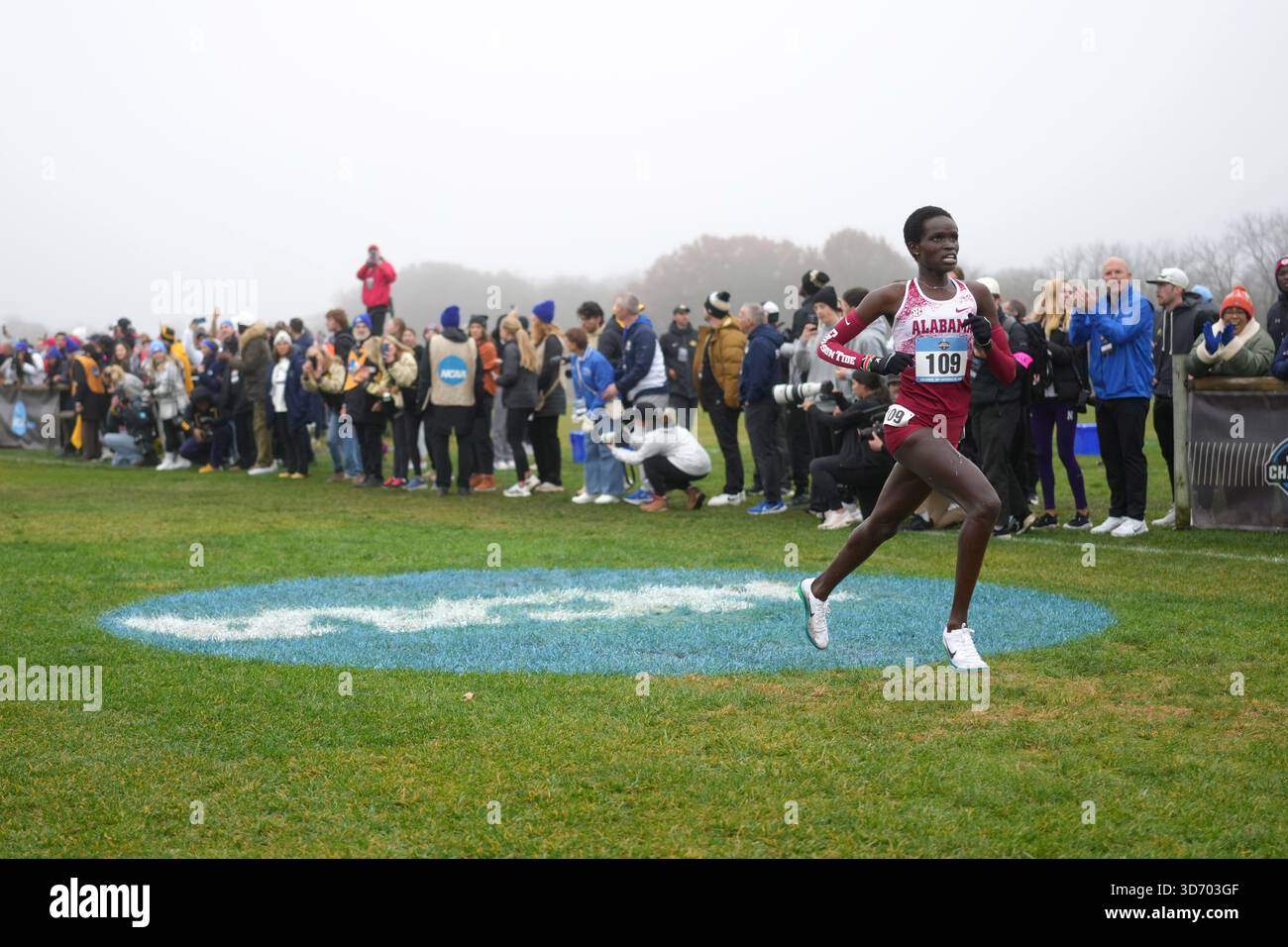 Doris Lemngole of Alabama wins the women's race in 18:25.4 during the ...