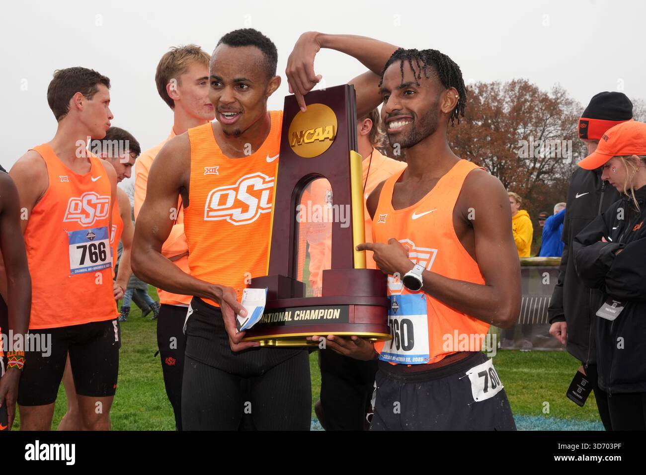 Brian Musau (767) and Adisu Guadia (760) of Oklahoma State pose with ...