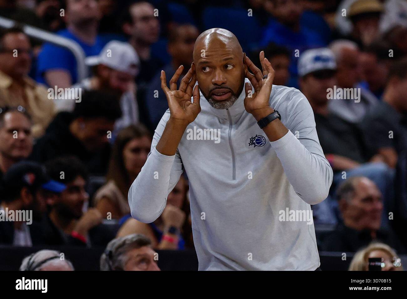 Orlando Magic head coach Jamahl Mosley listens to referee after a foul ...
