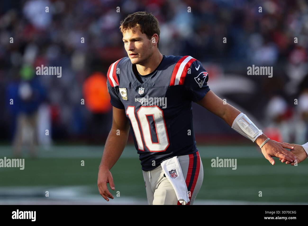 New England Patriots quarterback Drake Maye is congratulated against ...