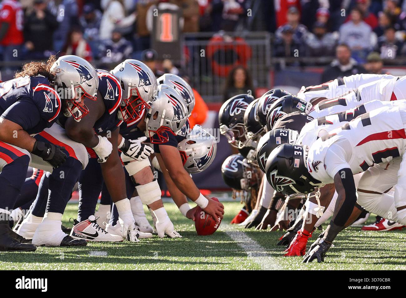 The New England Patriots and the Atlanta Falcons line up at the line of ...