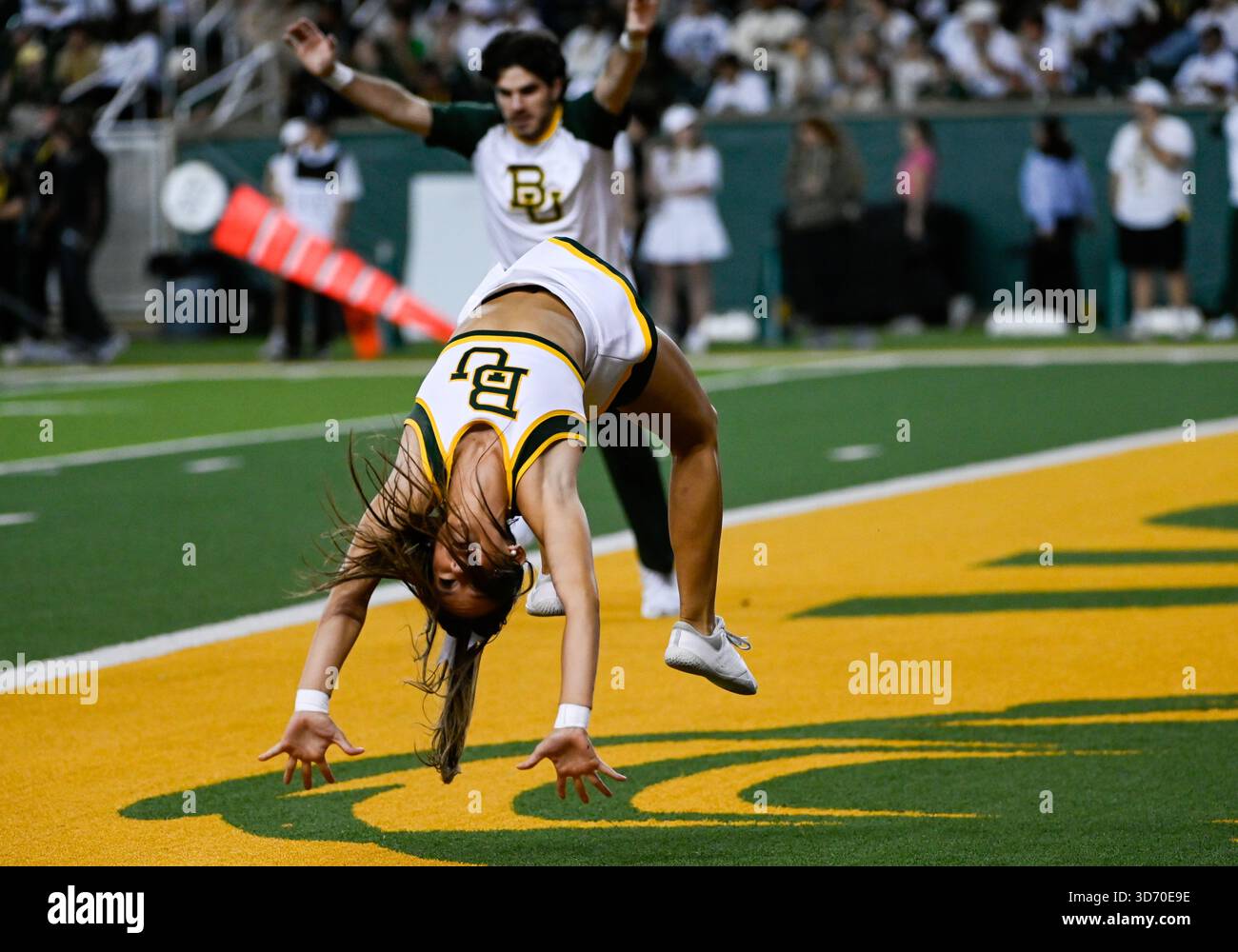 November 15, 2025 Baylor Bears cheerleader flps after a score during ...