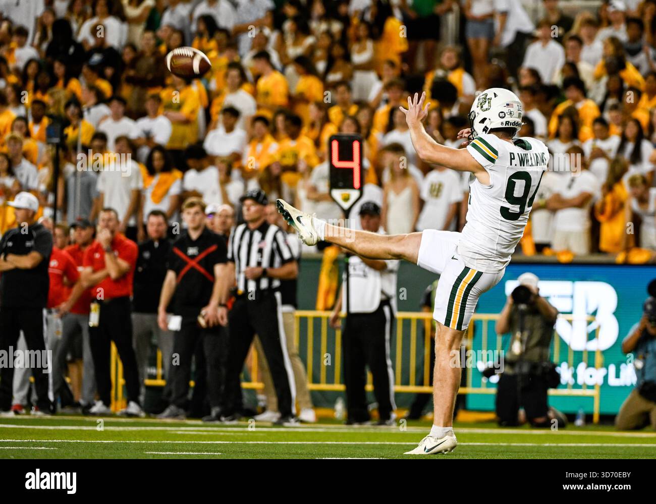 November 15, 2025 Baylor Bears punter Palmer Williams (94) punts the ...