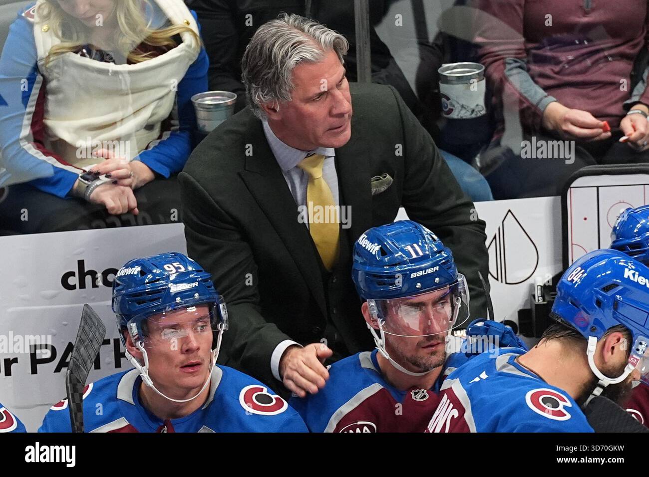 Colorado Avalanche head coach Jared Bednar confers with center Brock ...