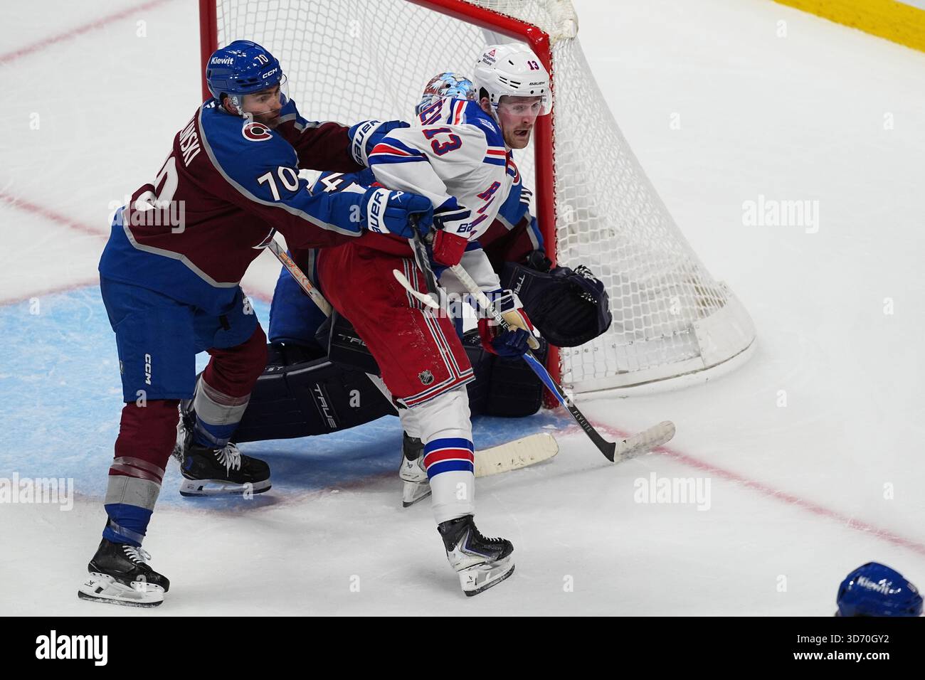 Colorado Avalanche defenseman Sam Malinski (70) checks New York Rangers ...