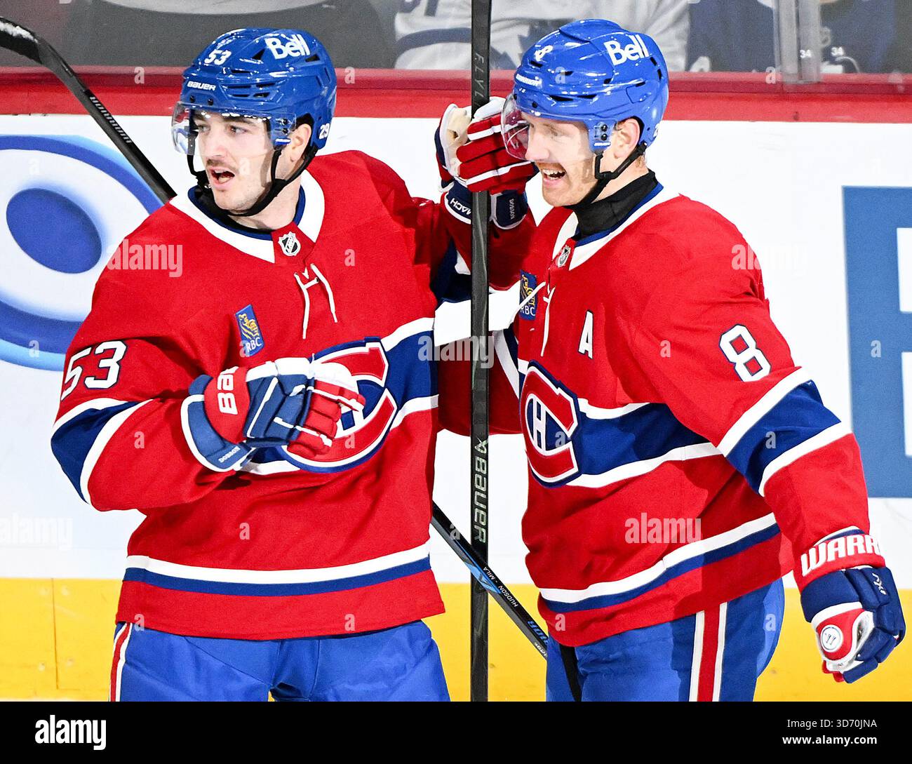 Montreal Canadiens' Noah Dobson (53) celebrates with teammate Mike ...
