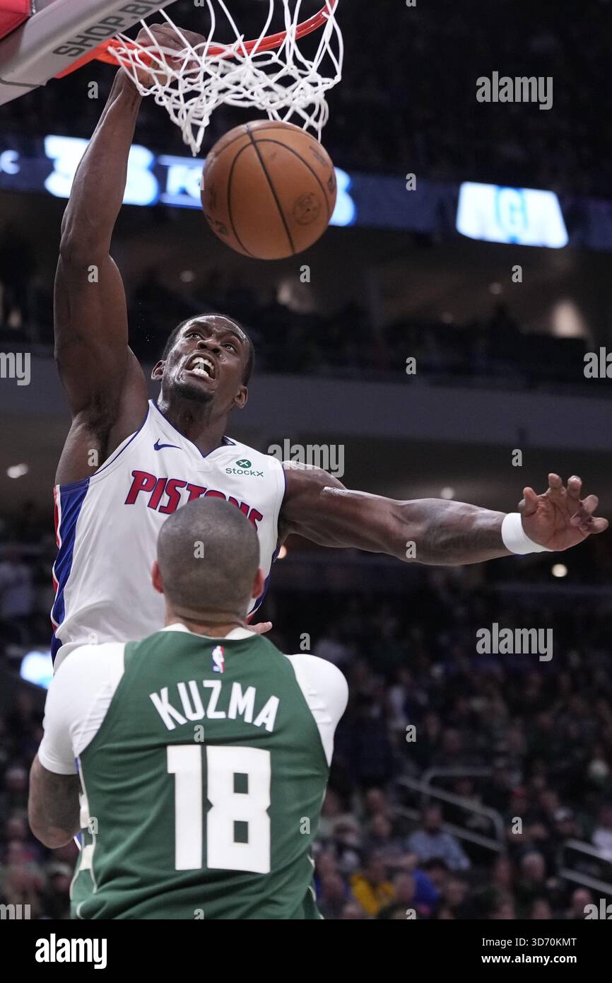 Detroit Pistons' Jalen Duren dunks over Milwaukee Bucks' Kyle Kuzma ...