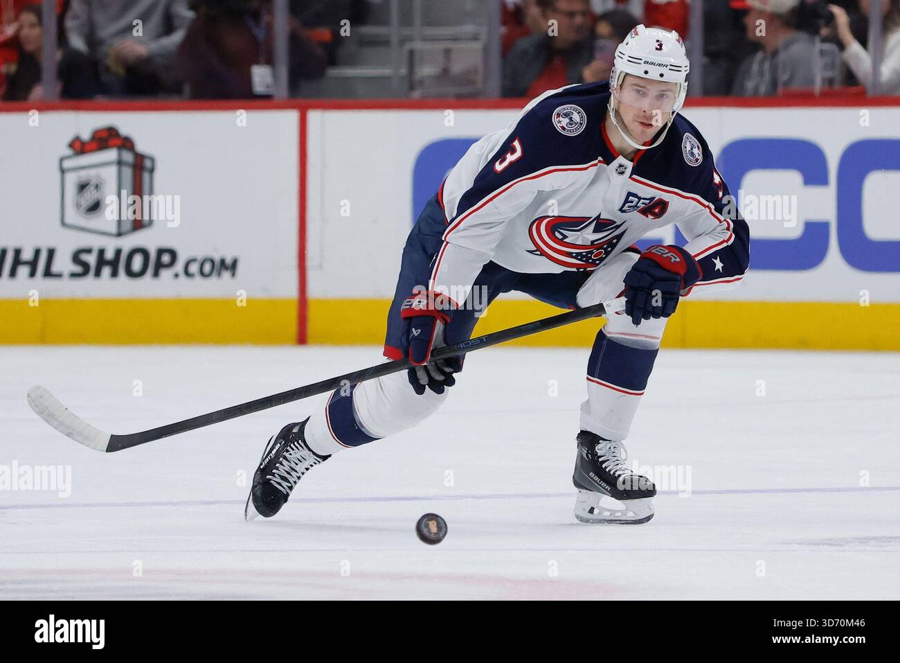 Columbus Blue Jackets center Charlie Coyle (3) move the puck against ...