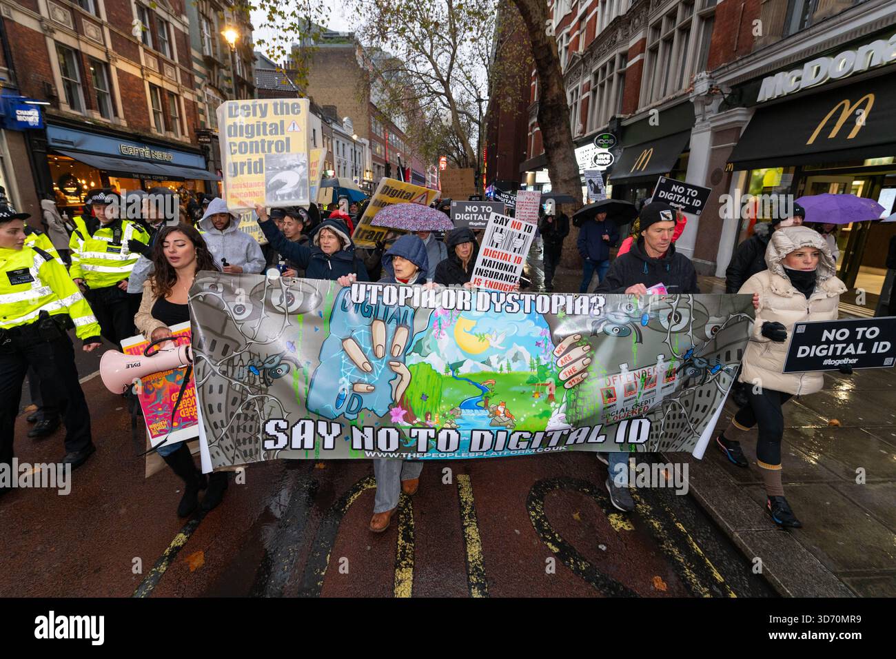 Protesters hold a banner reading "Say No To Digital ID" during the ...