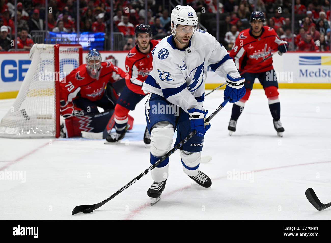 Tampa Bay Lightning right wing Oliver Bjorkstrand (22) passes the puck ...