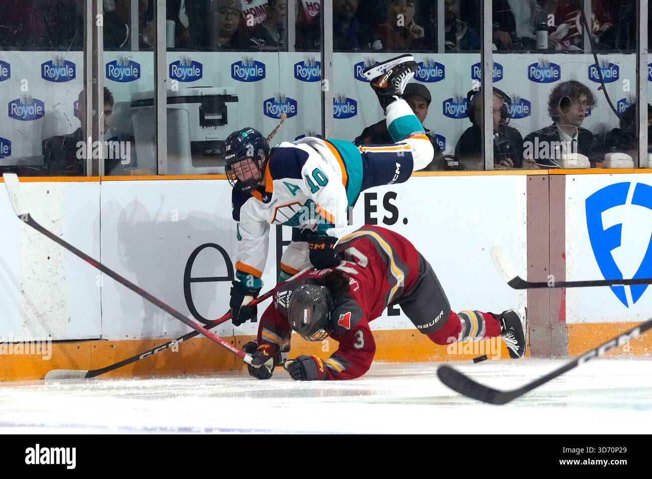 New York Sirens' Sarah Fillier (10) falls on top of Ottawa Charge's ...