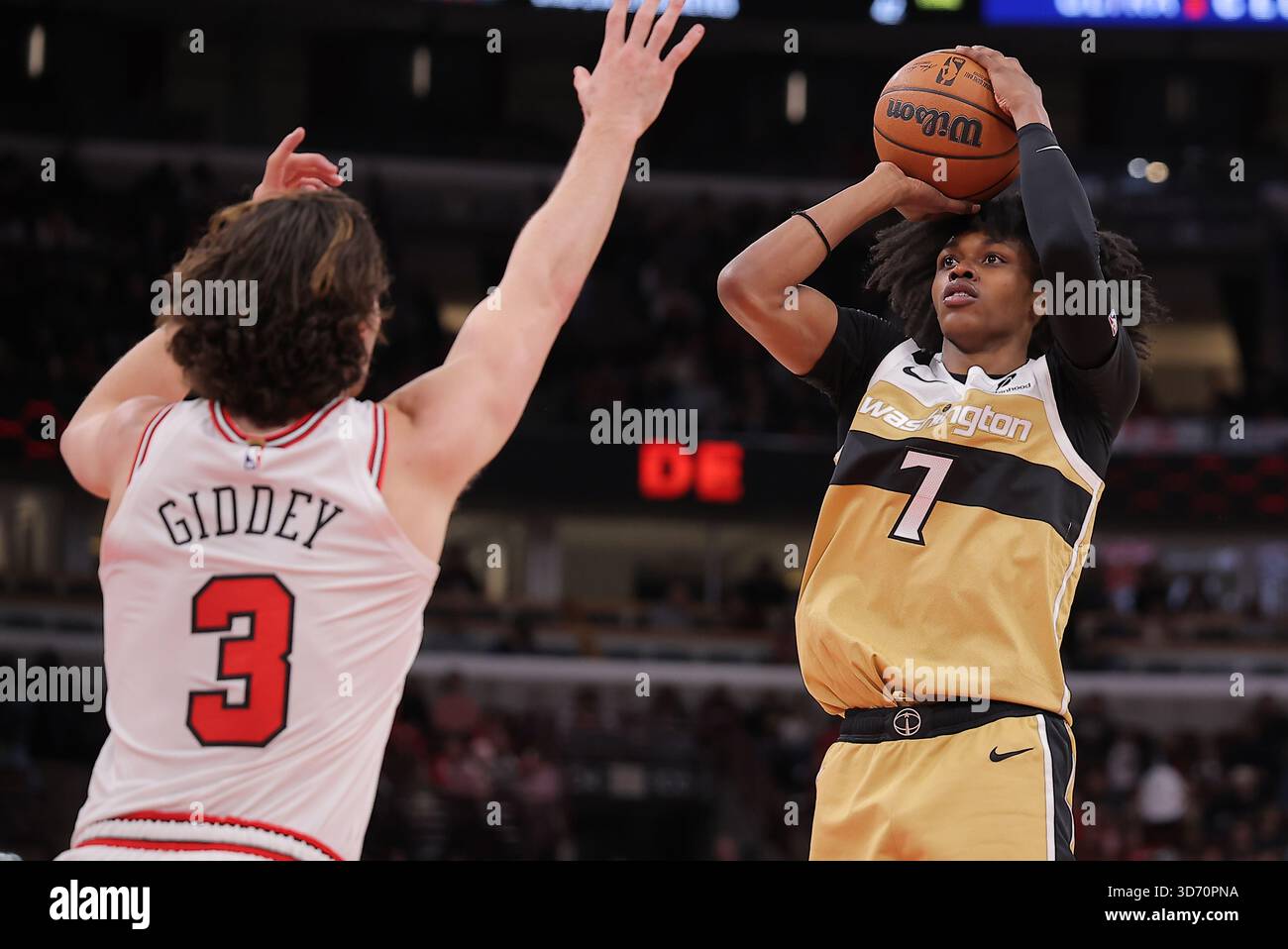Washington Wizards guard Bub Carrington (7) shoots a three-point basket ...