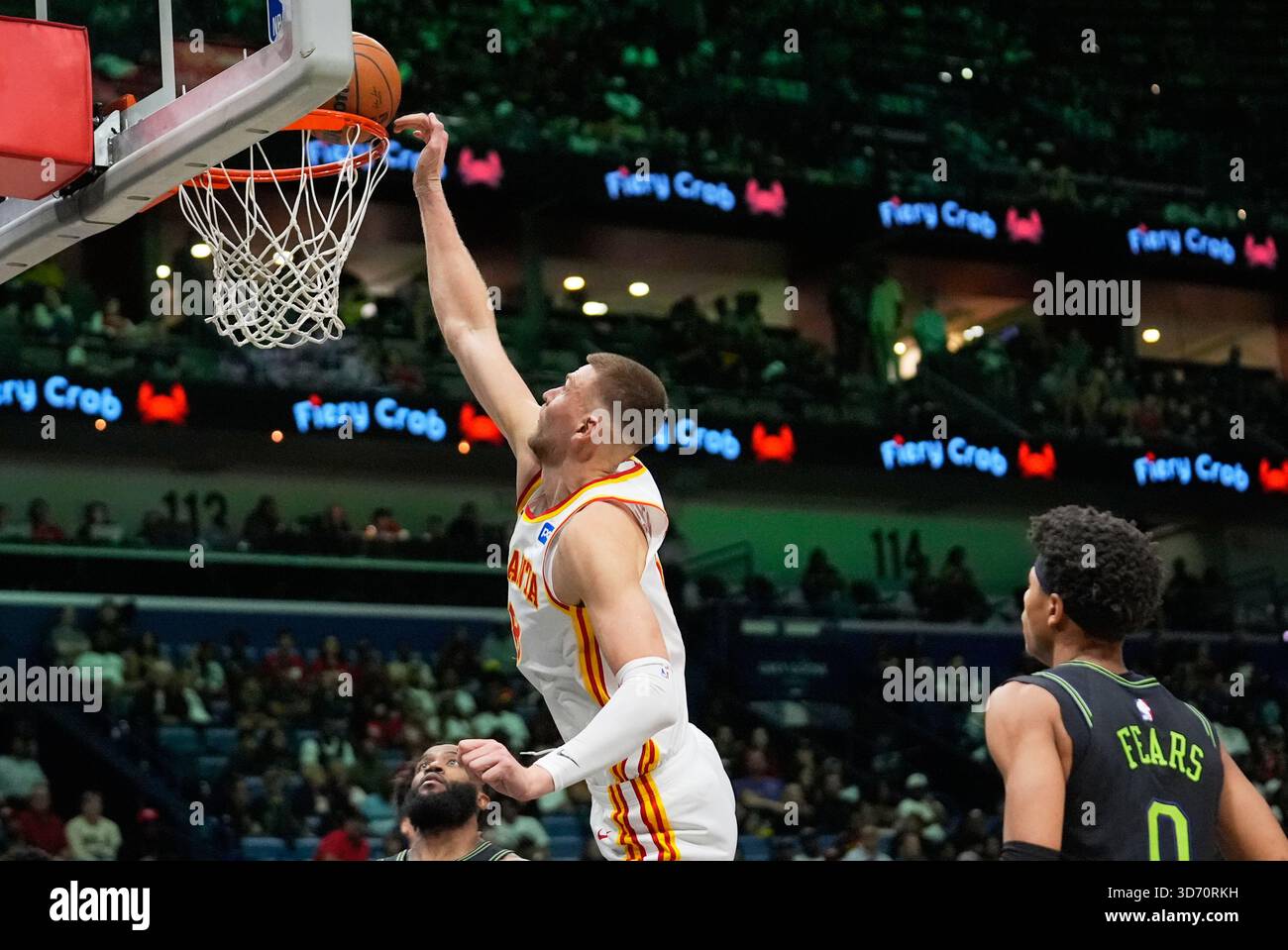 Atlanta Hawks center Kristaps Porzingis (8) slam dunks against the New ...