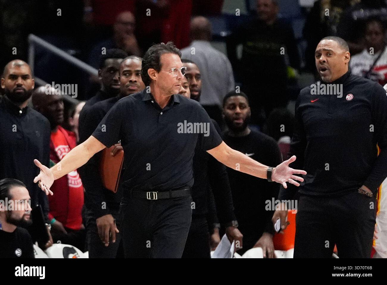 Atlanta Hawks head coach Quin Snyder calls out from the bench in the ...