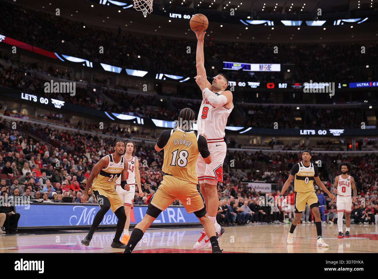 Chicago Bulls center Nikola Vucevic (9) shoots the ball over Washington ...