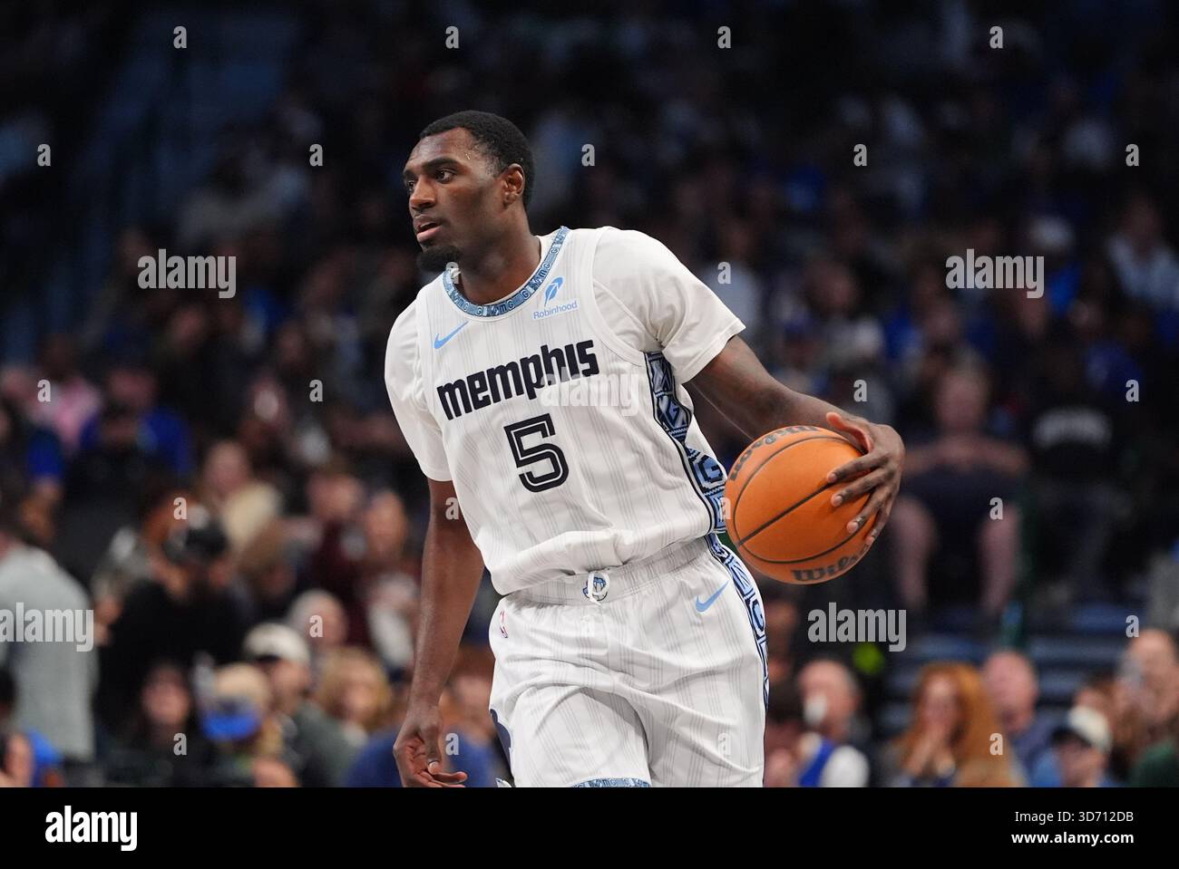 Memphis Grizzlies guard Vince Williams Jr. dribbles during the second half of an NBA basketball ...