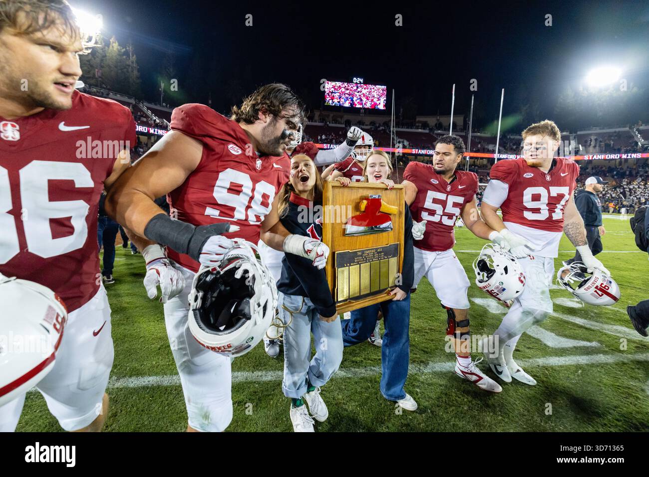 PALO ALTO, CA - NOVEMBER 22: The Stanford Cardinal carry the axe after ...