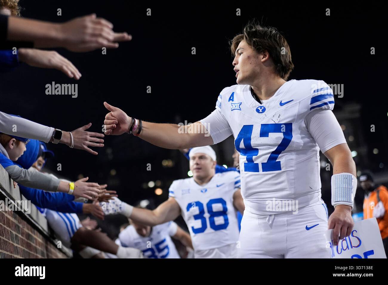 BYU quarterback Bear Bachmeier (47) greets fans after winning a NCAA ...