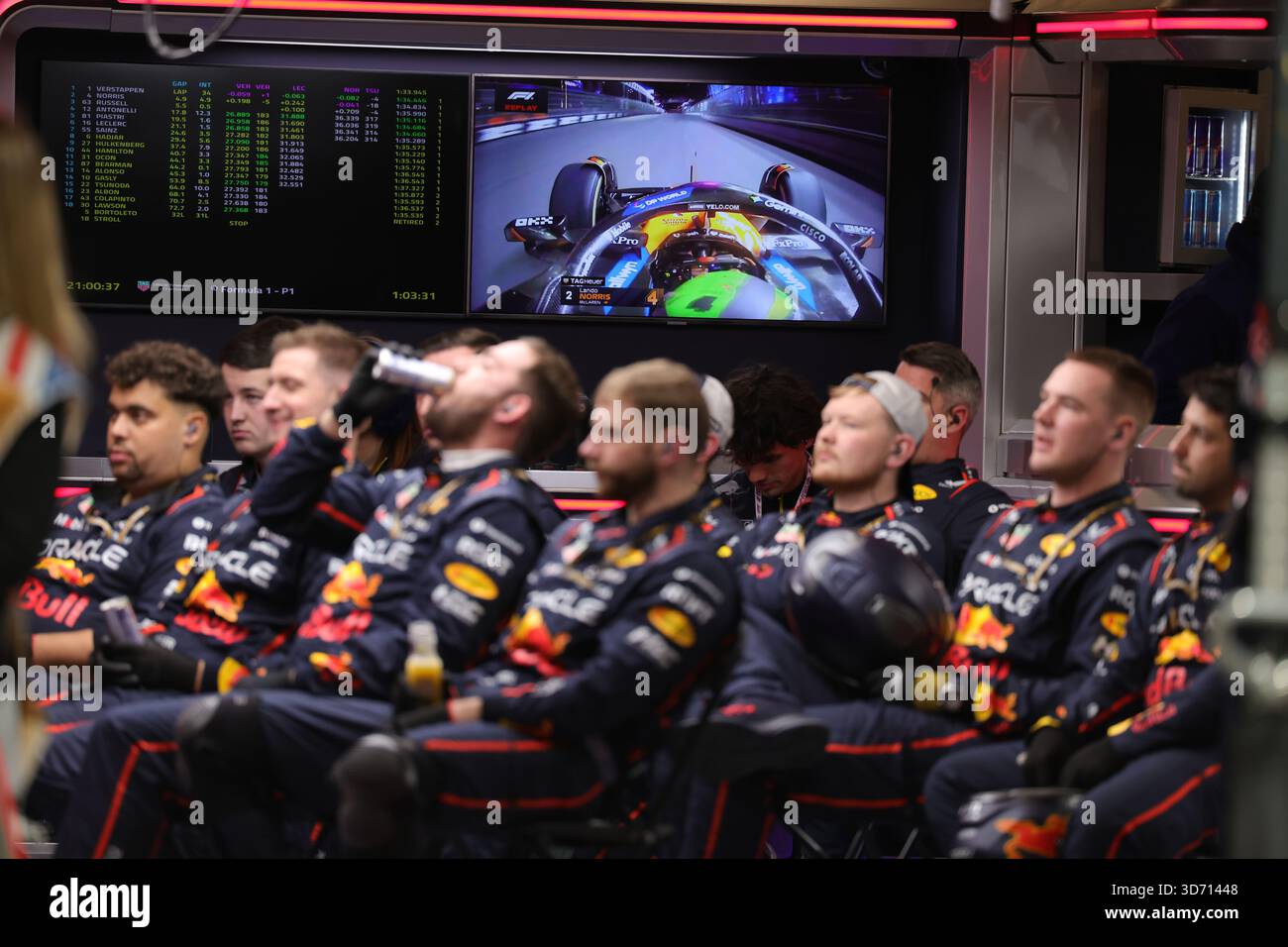 Red Bull crew members watch from the garage during the Formula One Las ...