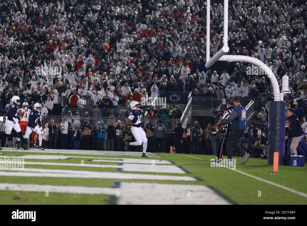 Penn State running back Nicholas Singleton runs into the end zone for a ...