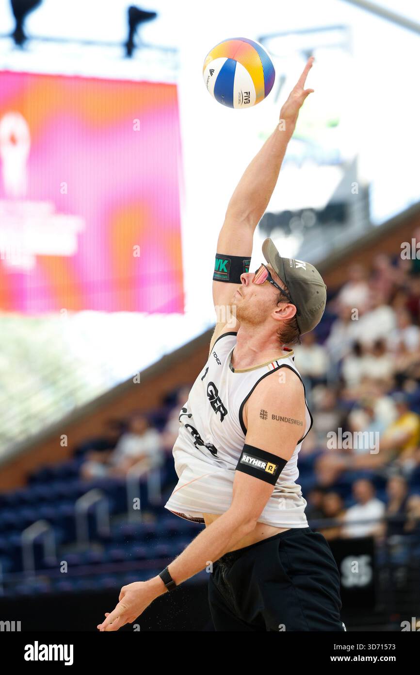 Nils Ehlers of Germany serves in the men's bronze medal match against ...