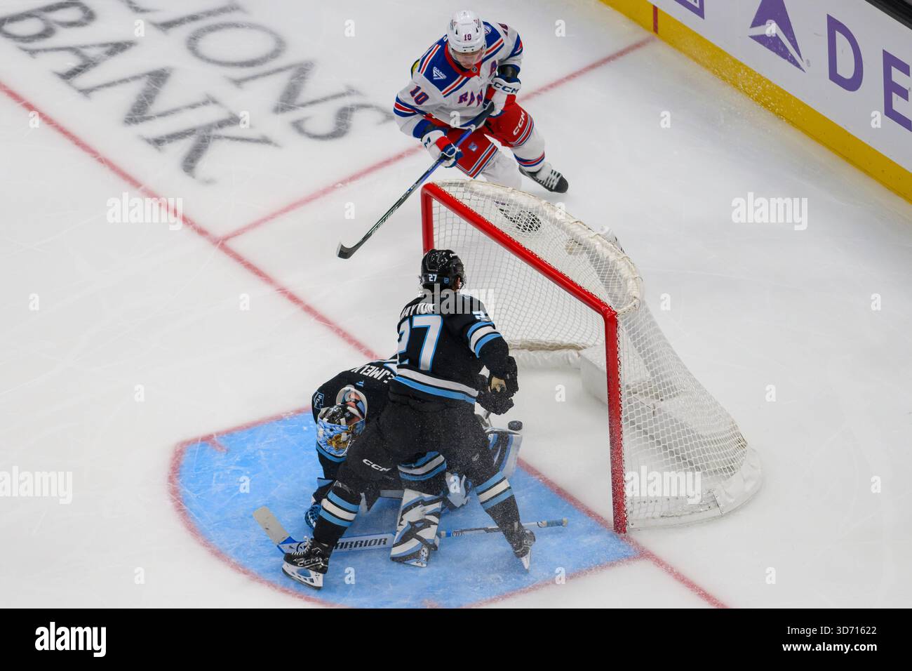 The puck crosses the goal line past Utah Mammoth goaltender Karel ...
