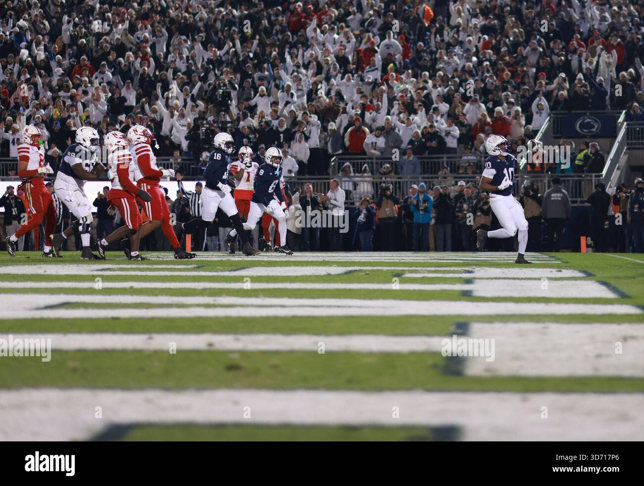 Penn State running back Nicholas Singleton (10) runs into the end zone ...