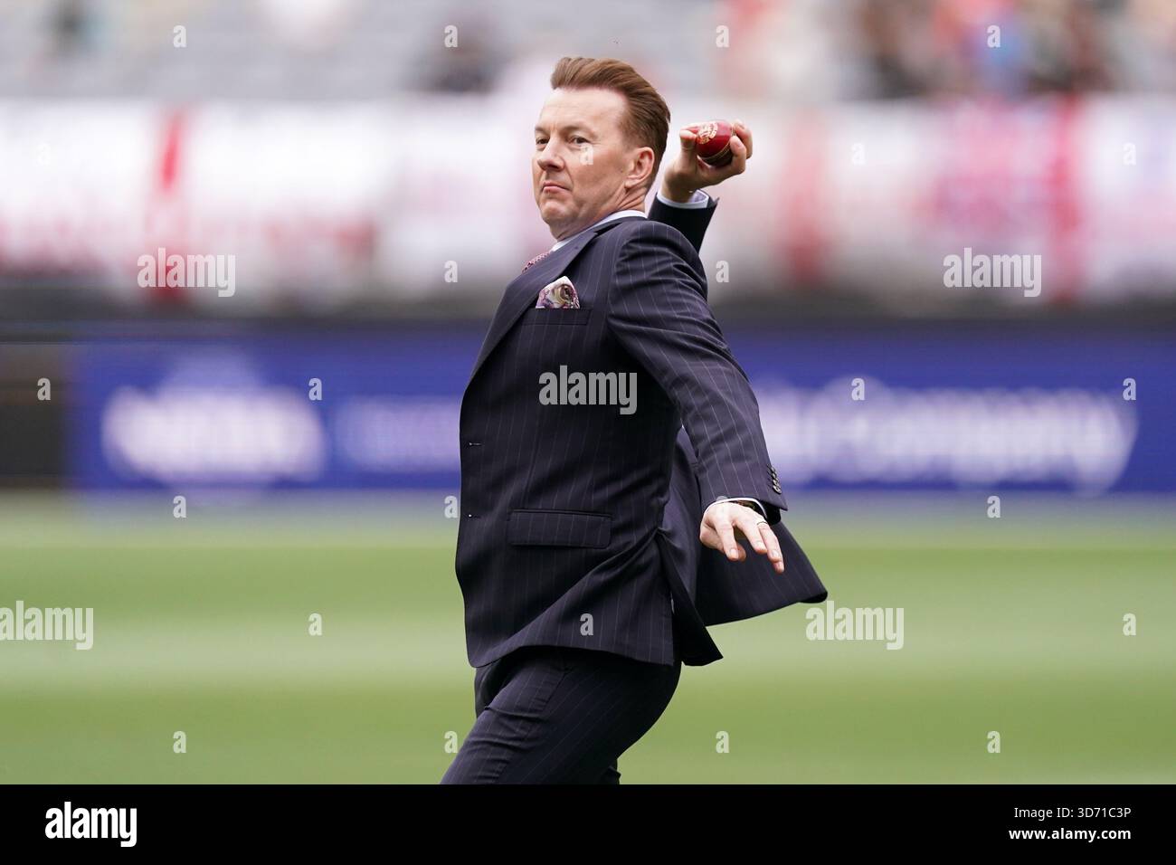 Former Australia bowler Brett Lee throws a ball on day two of the first ...