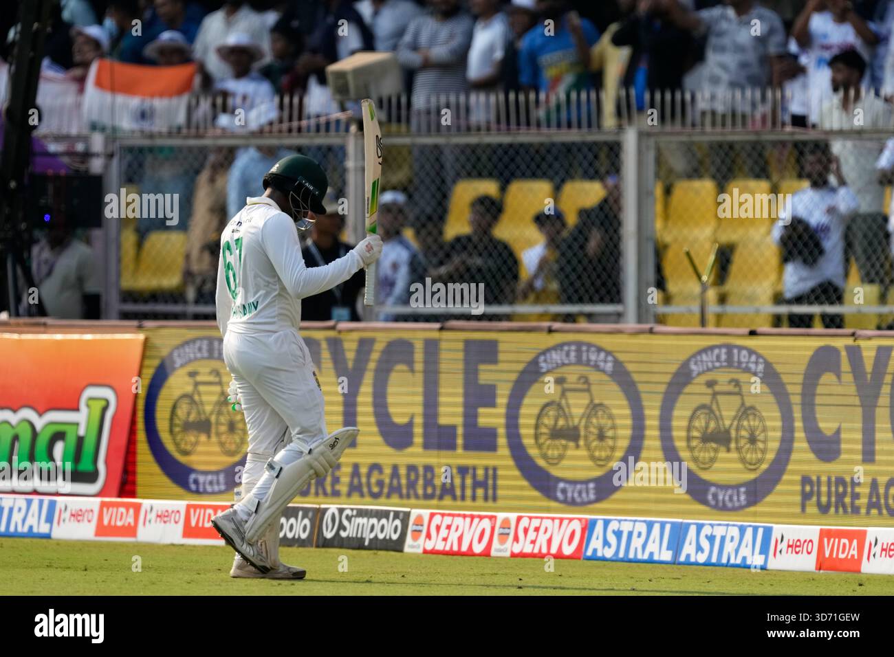 South Africa's Senuran Muthusamy walks off the field after losing his wicket on the second day ...