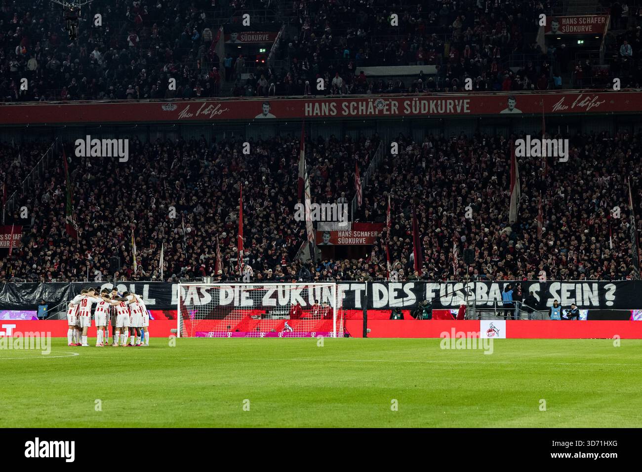 KOELN, GERMANY - NOVEMBER 25: Group huddle of 1. FC Cologne, Background ...