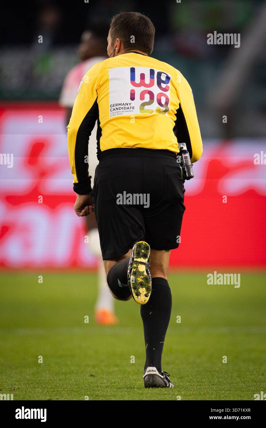 Wolfsburg, Germany. 22nd, November 2025. Referee Robert Hartmann seen ...