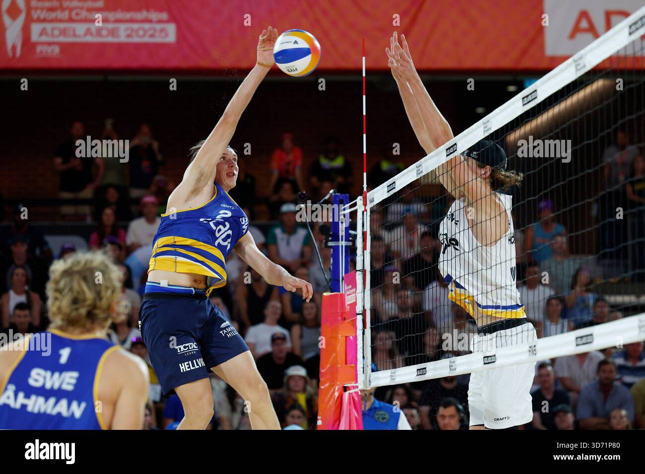 Sweden's Jonatan Hellvig, centre, and David Åhman play against Sweden's ...