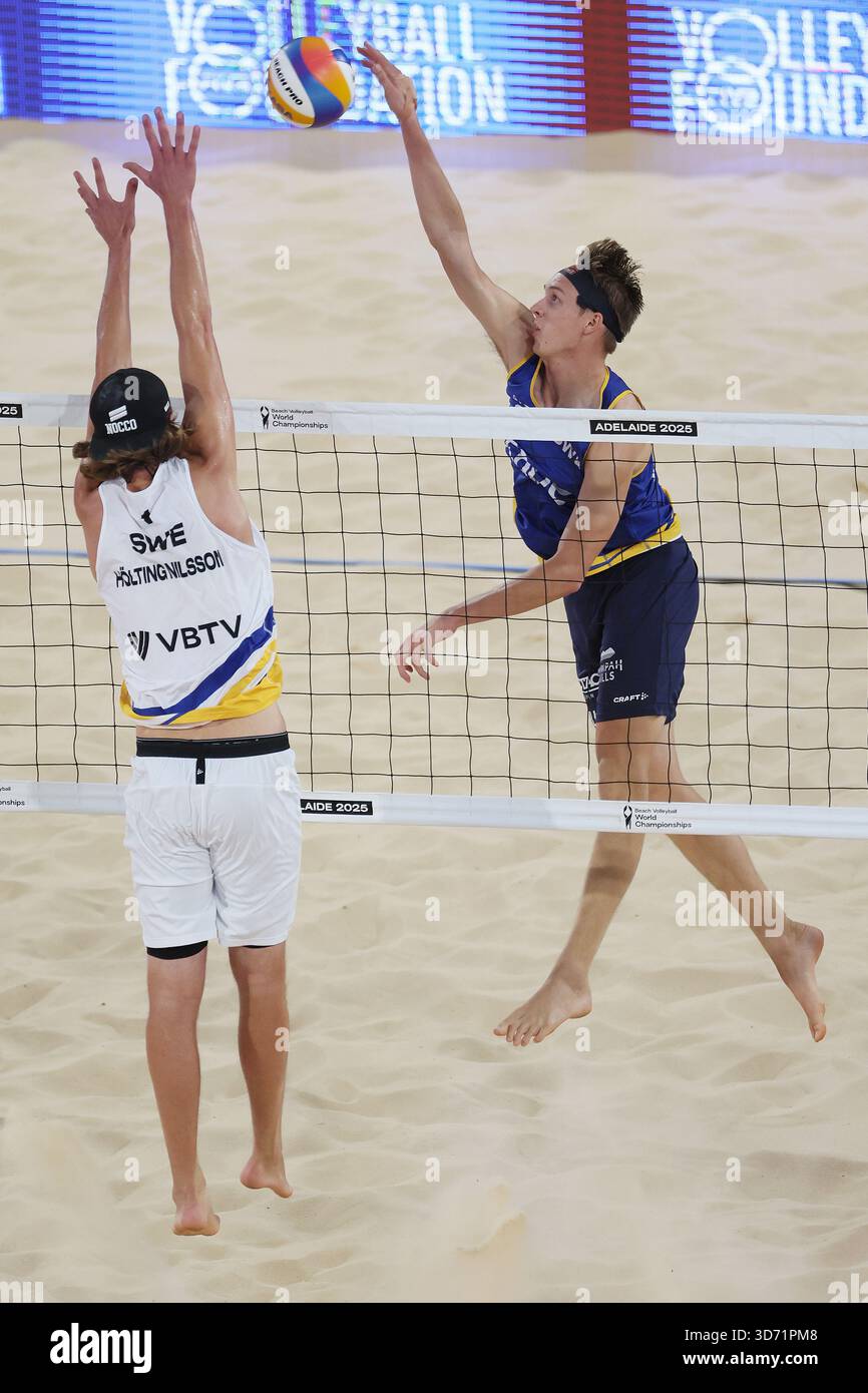 Sweden's Elmer Andersson, left, blocks against Sweden's Jonatan Hellvig ...