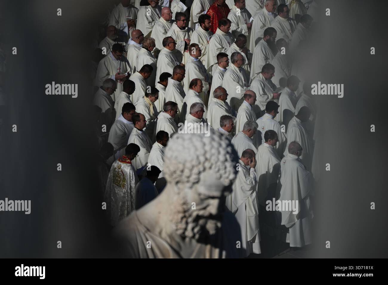 Priests pray as Pope Leo XIV celebrates a Mass for the Jubilee of the ...