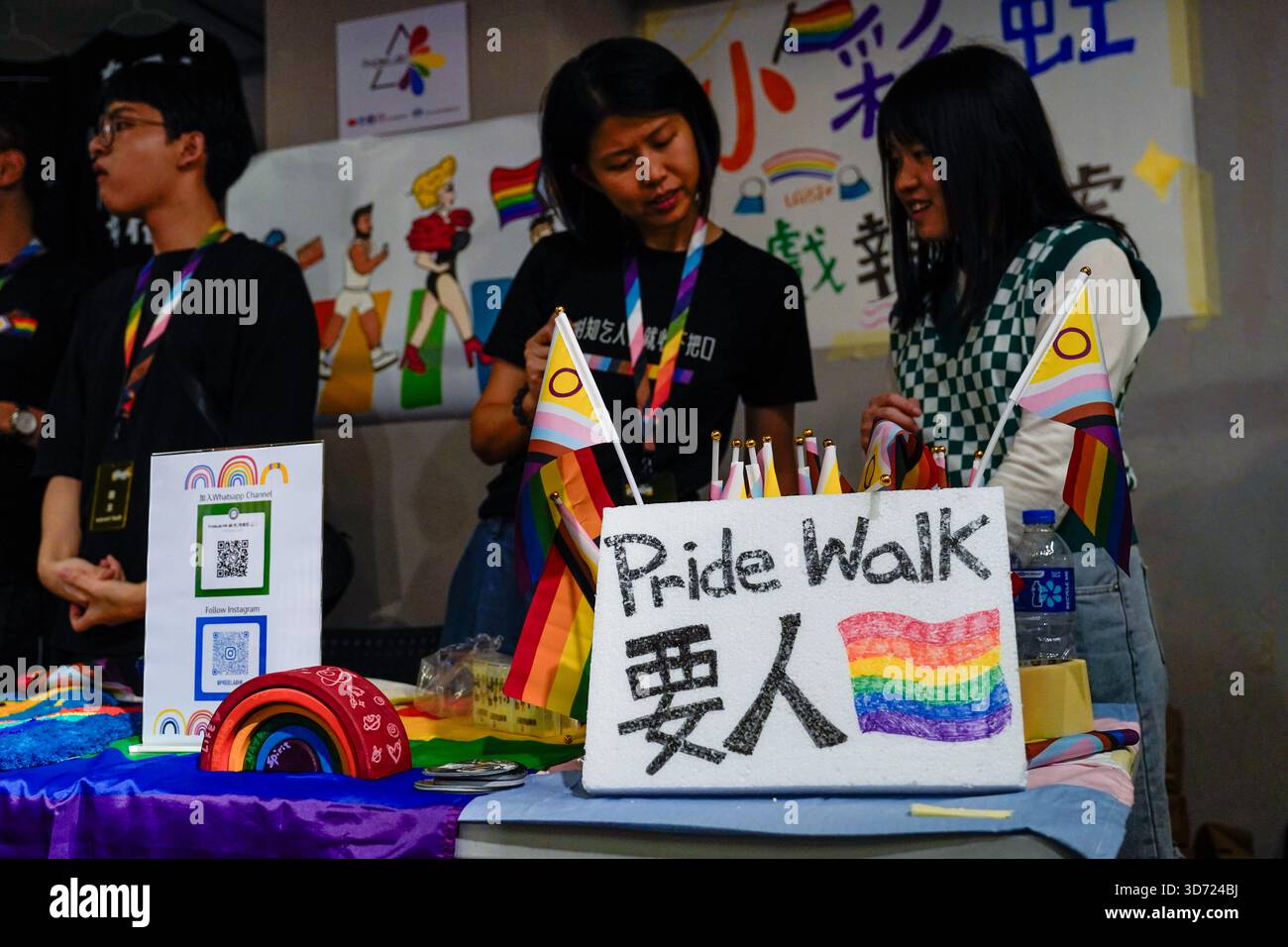 Workers at a pride walk booth at the Hong Kong Pride Parade Market on ...