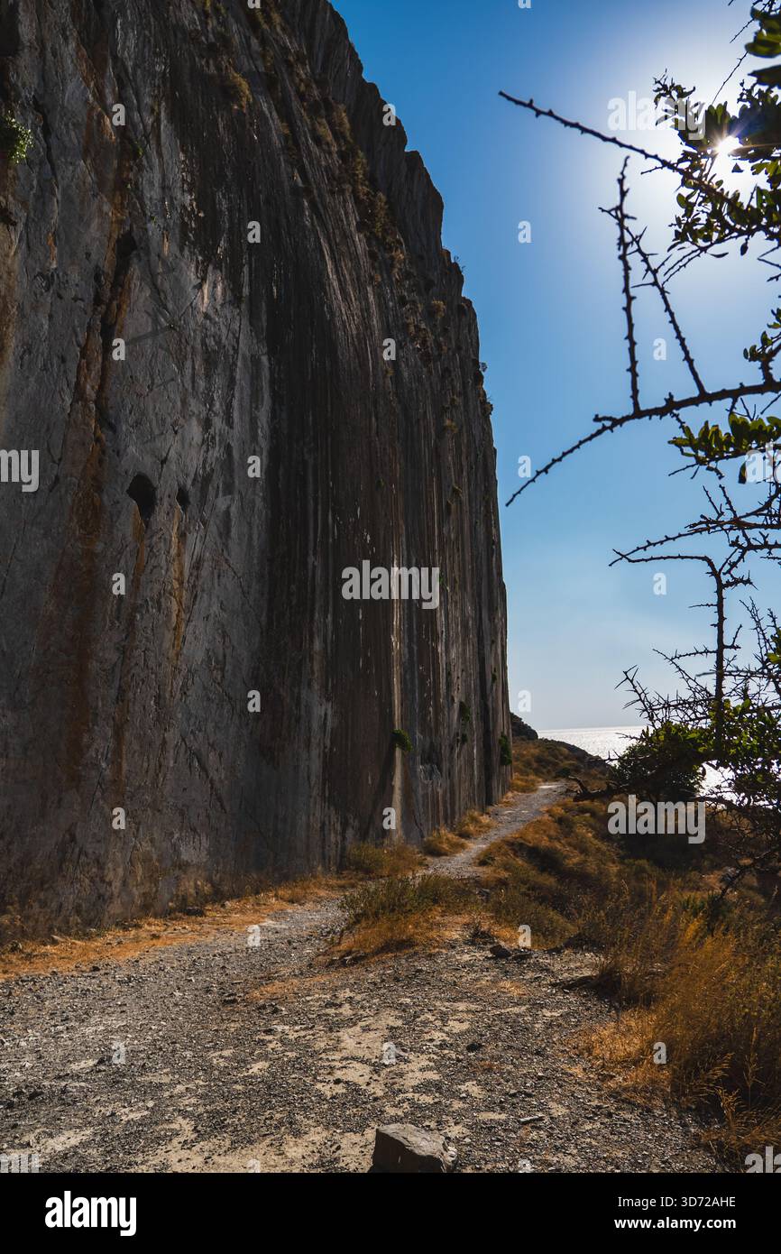 vertical wall photographed from the bottom of a rock cliff Stock Photo ...