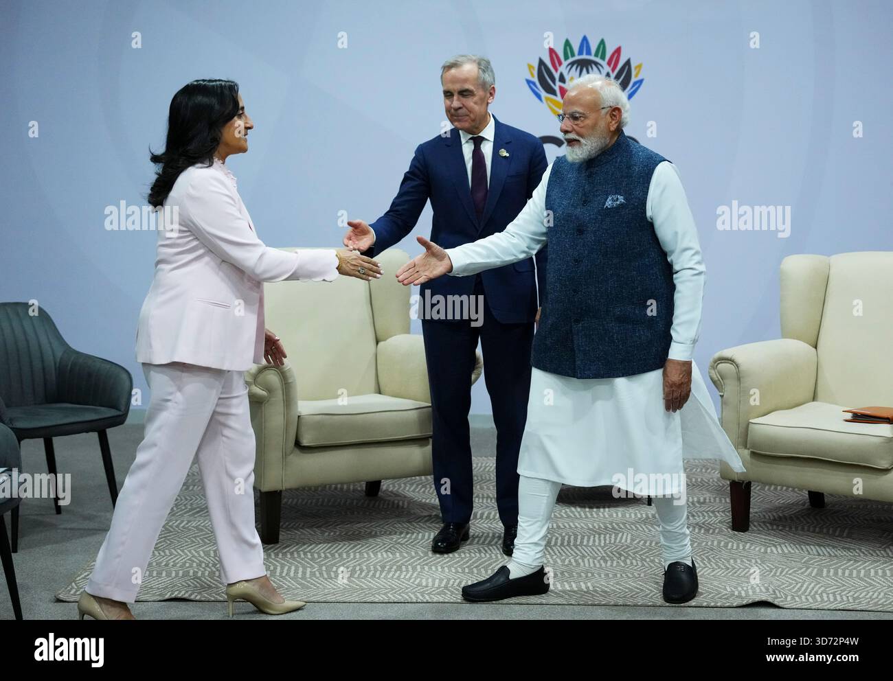 Prime Minister Mark Carney, middle, introduces Minister of Foreign ...