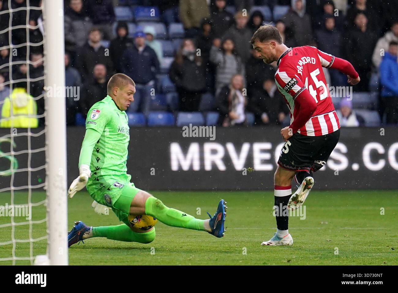 Sheffield United's Patrick Bamford has a shot saved by Sheffield ...