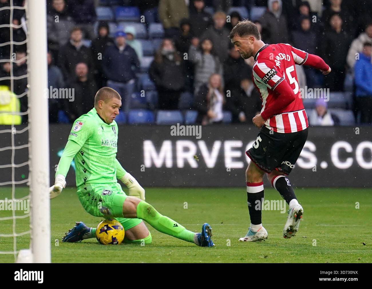 Sheffield United's Patrick Bamford has a shot saved by Sheffield ...