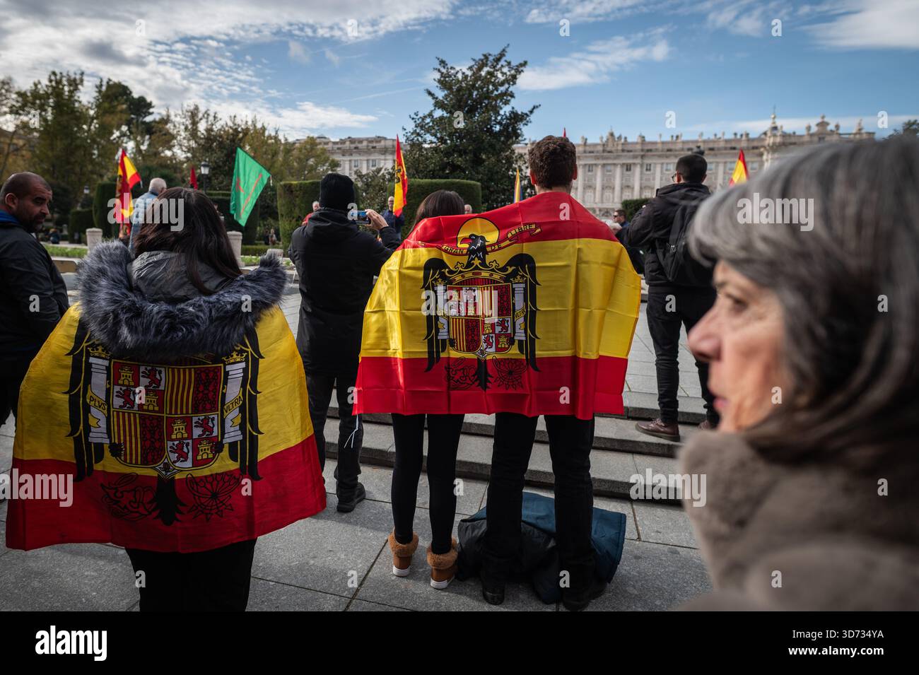 People wearing pre-constitutional Spanish flags are seen during a ...