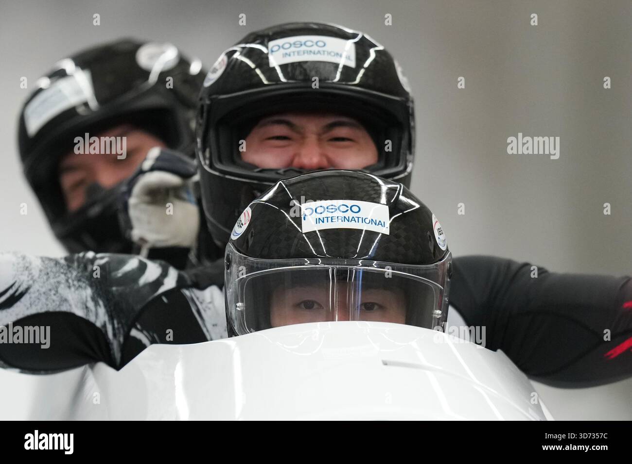 Kim Jinsu, Kim Sunwook, Kim Hyeonggeun and Lee Geonu, of South Korea, react as they finish their ...