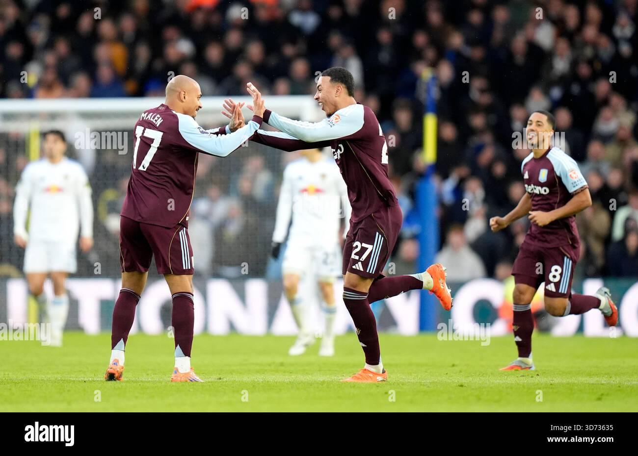 Aston Villa's Morgan Rogers (centre) celebrates scoring their side's ...