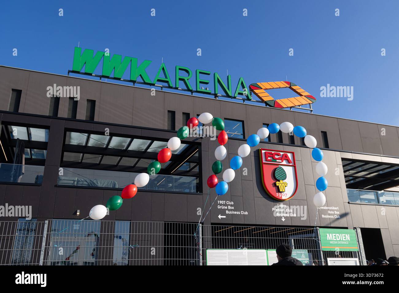 Colorful balloons in front of the entrance to the WWK Arena; FC FC ...