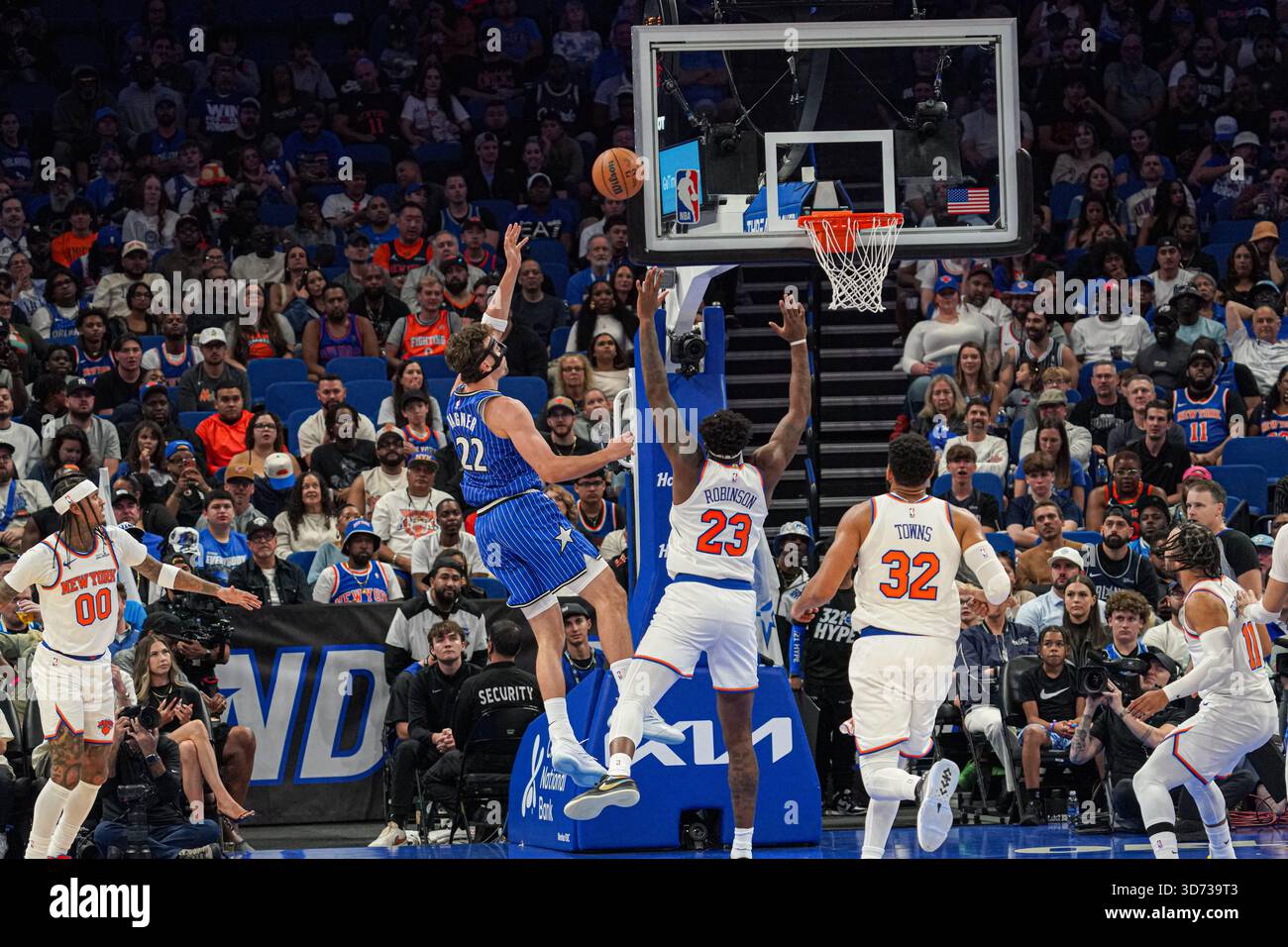 Orlando, Florida, USA, November 22, 2025, Orlando Magic forward Franz Wagner #22 attempt to ...