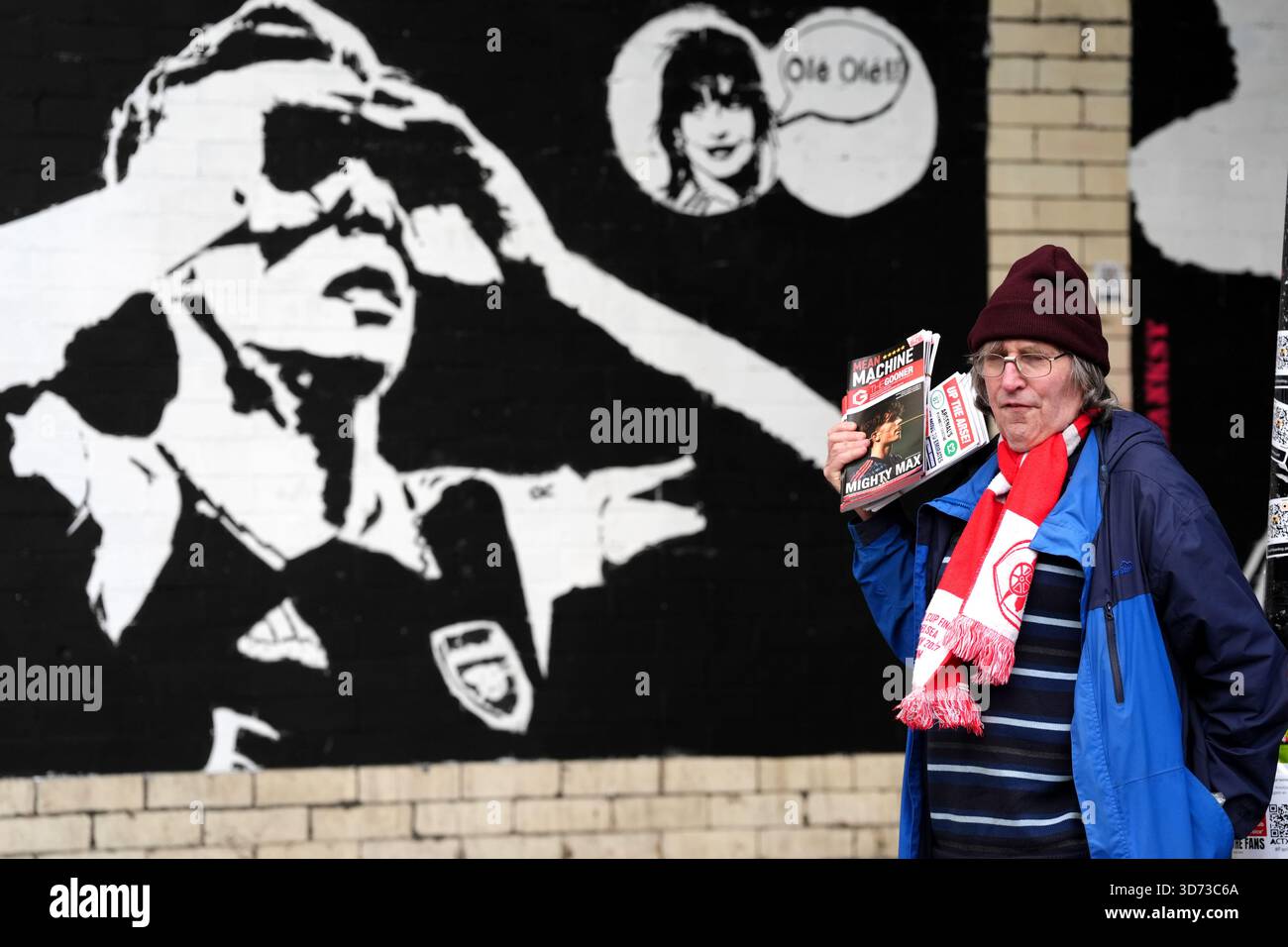 A programme vendor ahead of the Premier League match at the Emirates ...
