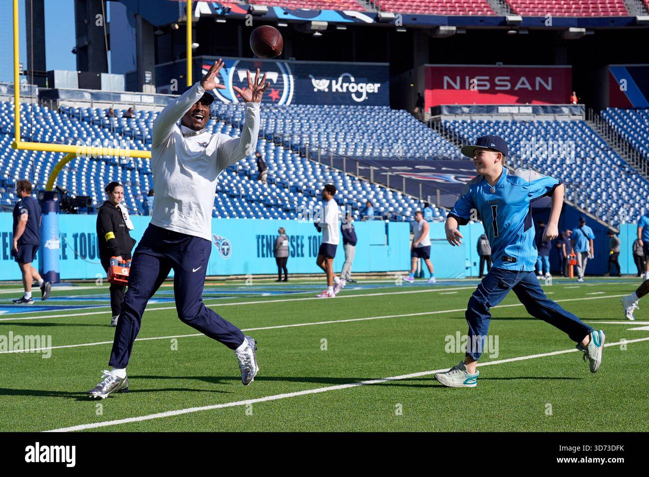 Tennessee Titans wide receiver James Proche II, left, catches a ball as ...