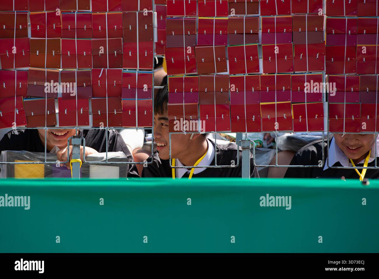 The students teamed up to perform card stunts on grandstand at the 31st ...