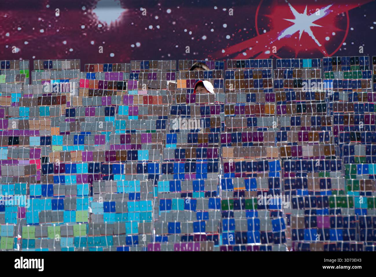 The students teamed up to perform card stunts on grandstand at the 31st ...