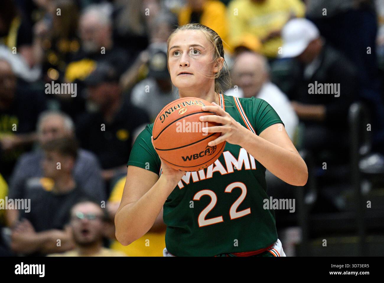 Miami guard Simone Pelish (22) attempts a 3-pointer during an NCAA ...